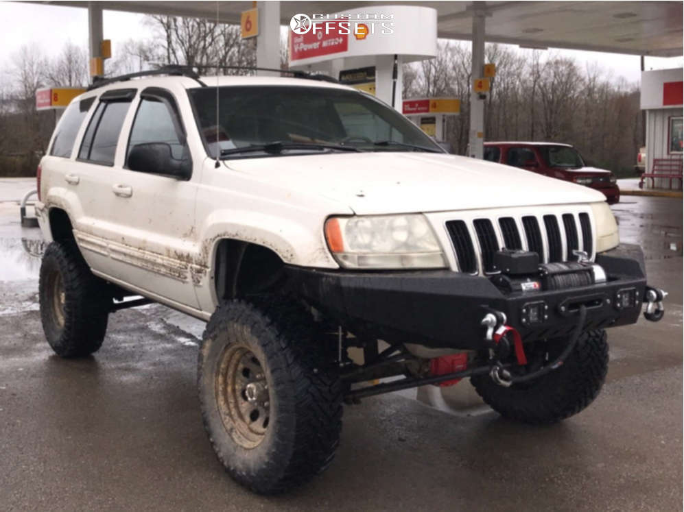 2001 Jeep Grand Cherokee with 16x8 -12 Vision Soft 8 and 265/75R16 ...