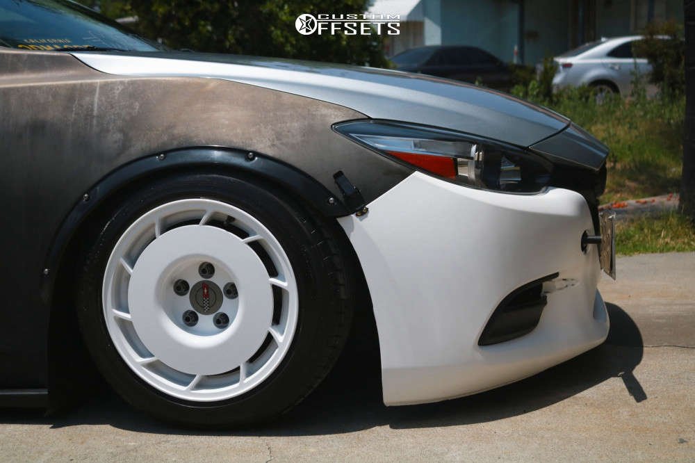 2017 Mazda 3 with 16x9.5 38 Enkei Salad Shooters and 215/50R16 Achilles 2233 and Coilovers ...