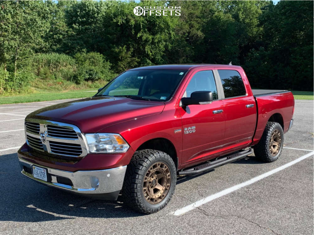 2017 Ram 1500 with 20x9.5 0 Black Rhino Cinco and 33/12.5R20 Nitto ...