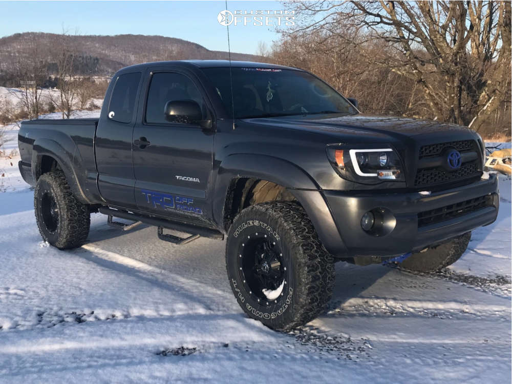 2011 Toyota Tacoma with 17x9 -12 TIS 535B and 285/70R17 Milestar ...