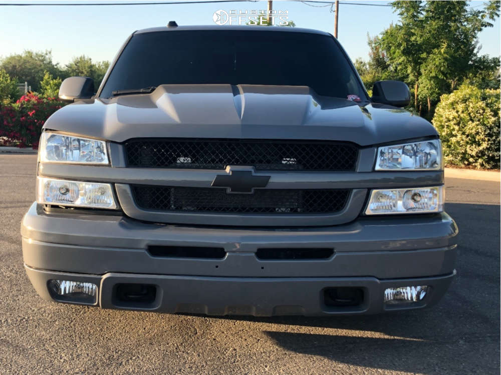2005 Chevrolet Silverado 1500 with 22x9 24 OE Performance 113 and 265 ...