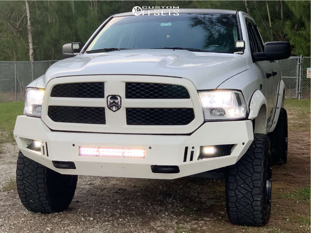 2017 Ram 1500 with 20x12 -44 Tuff T10 and 33/12.5R20 Nitto Ridge ...