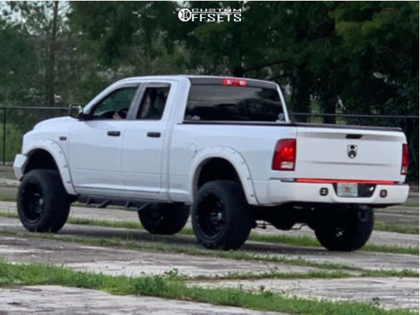 2017 Ram 1500 with 20x12 -44 Tuff T10 and 33/12.5R20 Nitto Ridge ...