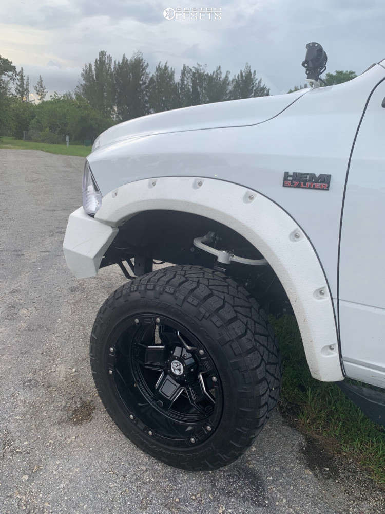 2017 Ram 1500 with 20x12 -44 Tuff T10 and 33/12.5R20 Nitto Ridge ...