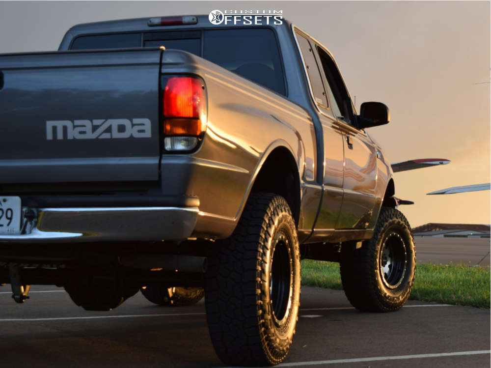 1999 Ford Ranger with 15x8 -24 Raceline Defender and 31/10.5R15 Falken ...