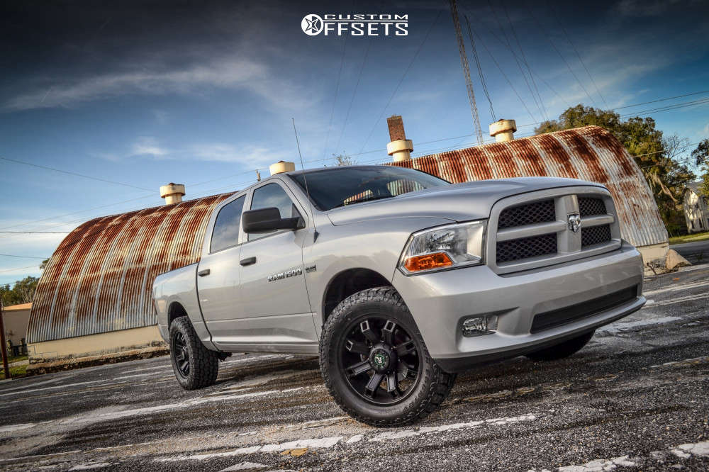 2014 Ram 1500 with 20x9 0 Remington Hollow Point and 33/12.5R20 Toyo ...