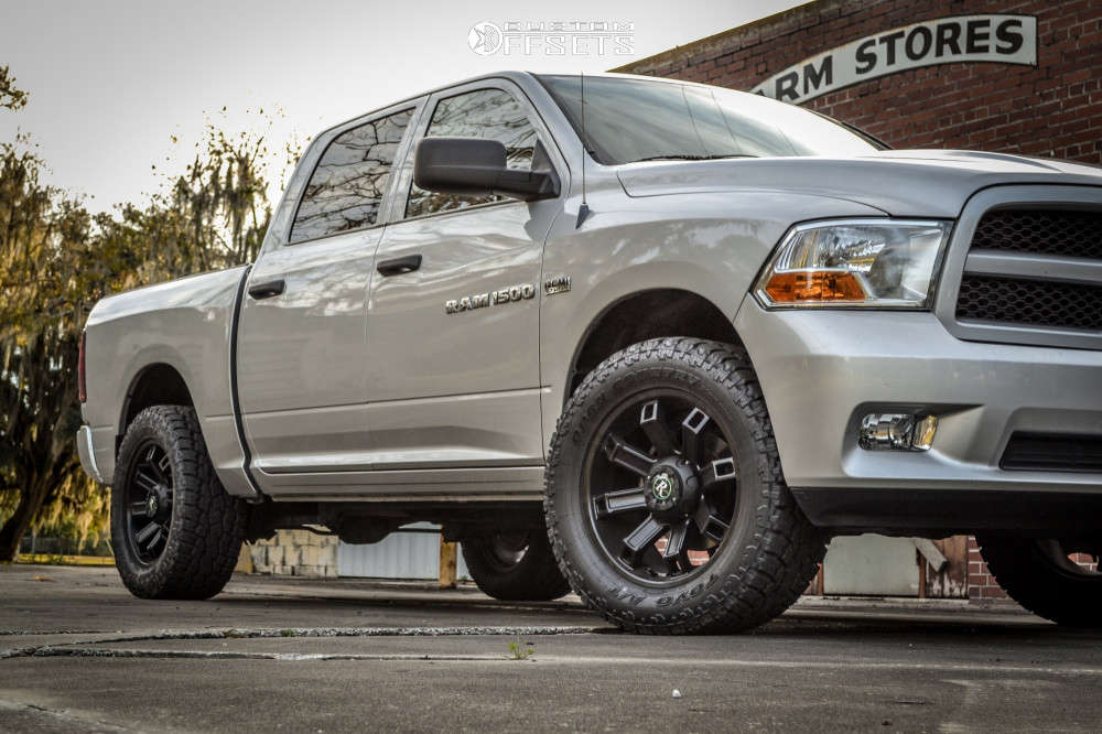 2014 Ram 1500 with 20x9 0 Remington Hollow Point and 33/12.5R20 Toyo ...