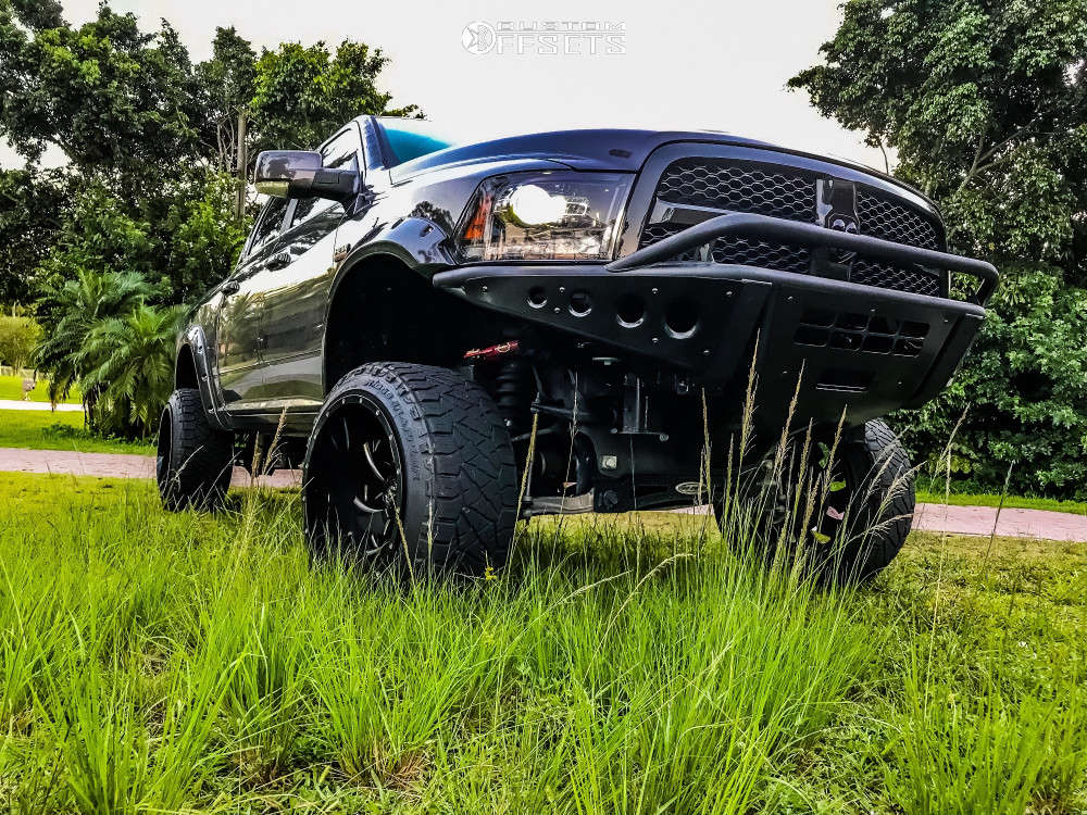 2017 Ram 1500 with 22x14 -76 Fuel Cleaver and 33/12.5R22 Nitto Ridge ...