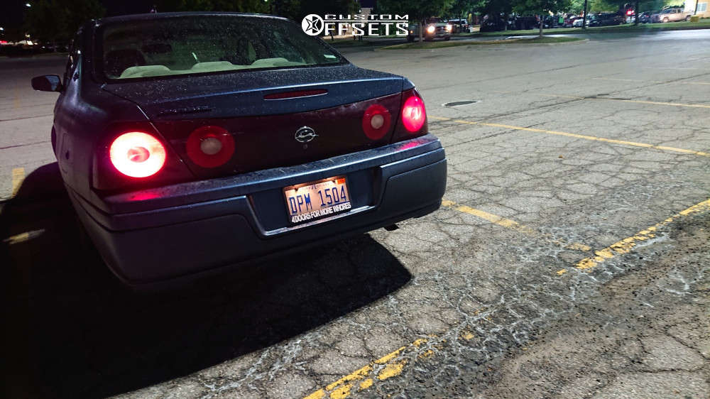 2003 Chevrolet Impala with 16x7 40 Raceline Encore and 225/60R16 ...