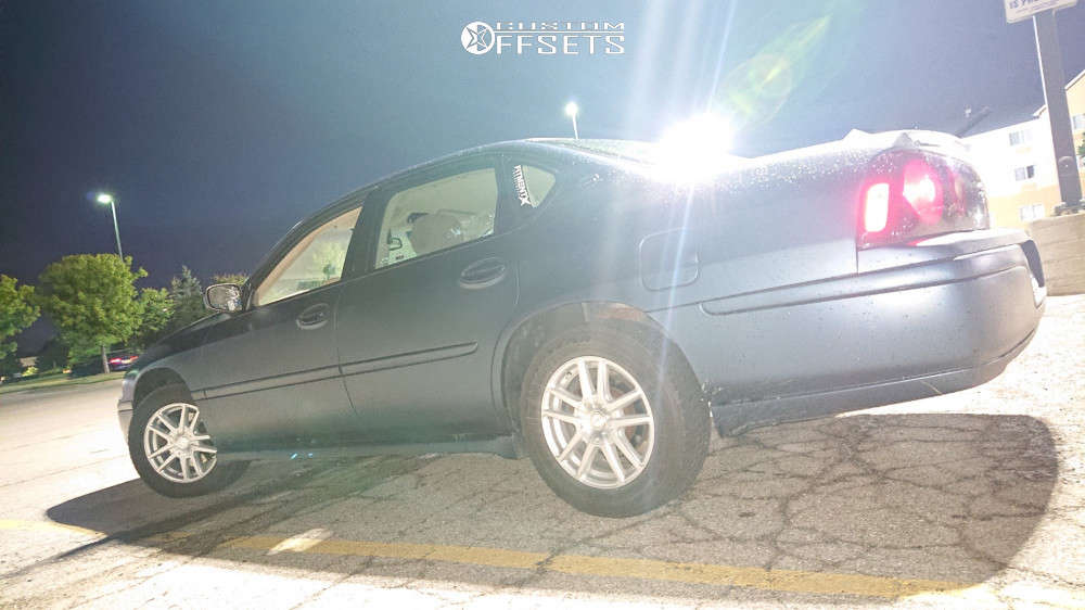 2003 Chevrolet Impala with 16x7 40 Raceline Encore and 225/60R16 ...