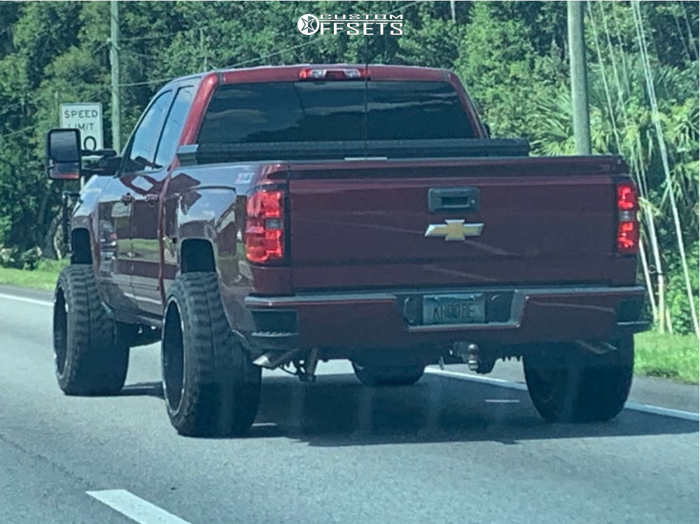 2016 Chevrolet Silverado 1500 with 22x14 -76 TIS 544BM and 33/14.5R22 Fury Offroad Country ...