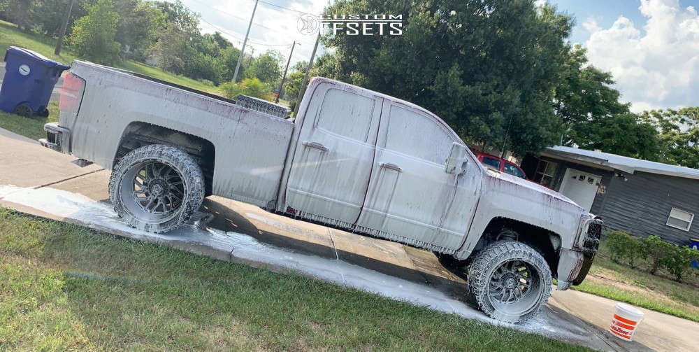 2016 Chevrolet Silverado 1500 with 22x14 -76 TIS 544BM and 33/14.5R22 Fury Offroad Country ...