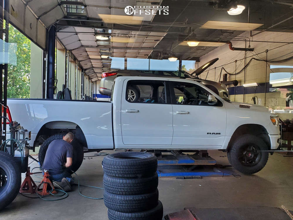 2019 Ram 1500 with 18x9 -12 Vision Split and 275/70R18 Falken Wildpeak ...