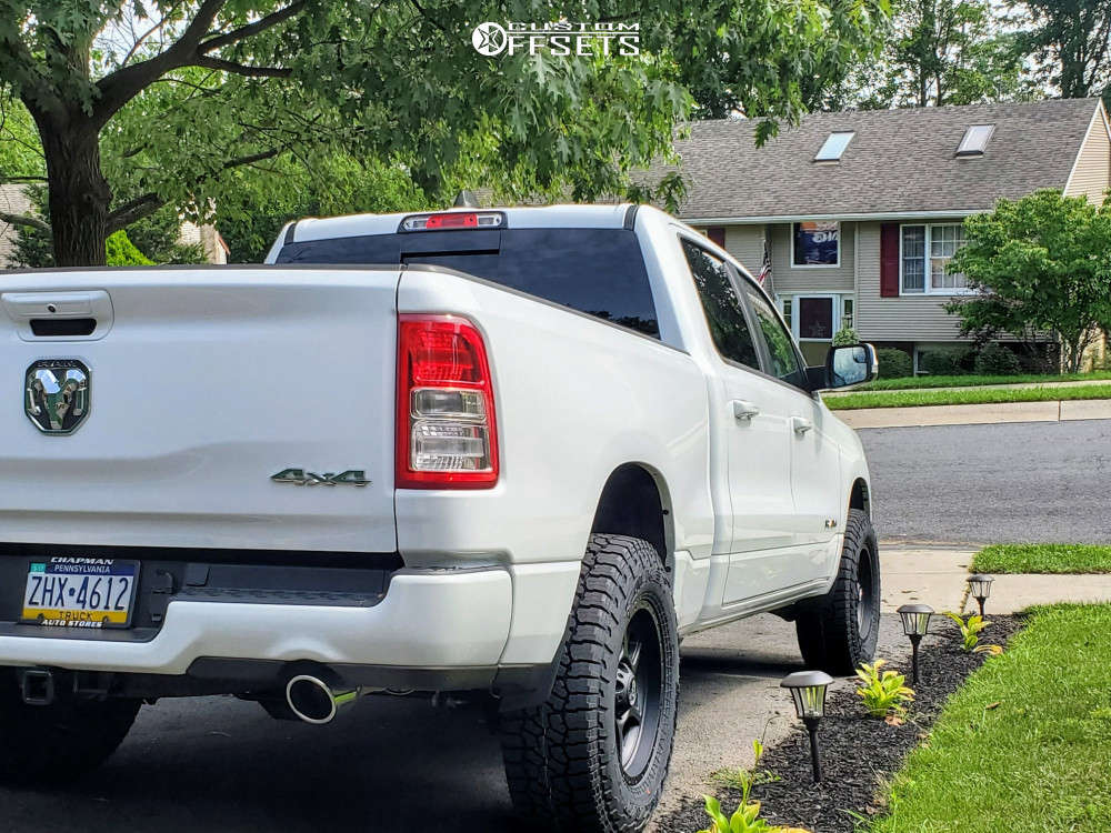 2019 Ram 1500 with 18x9 -12 Vision Split and 275/70R18 Falken Wildpeak ...