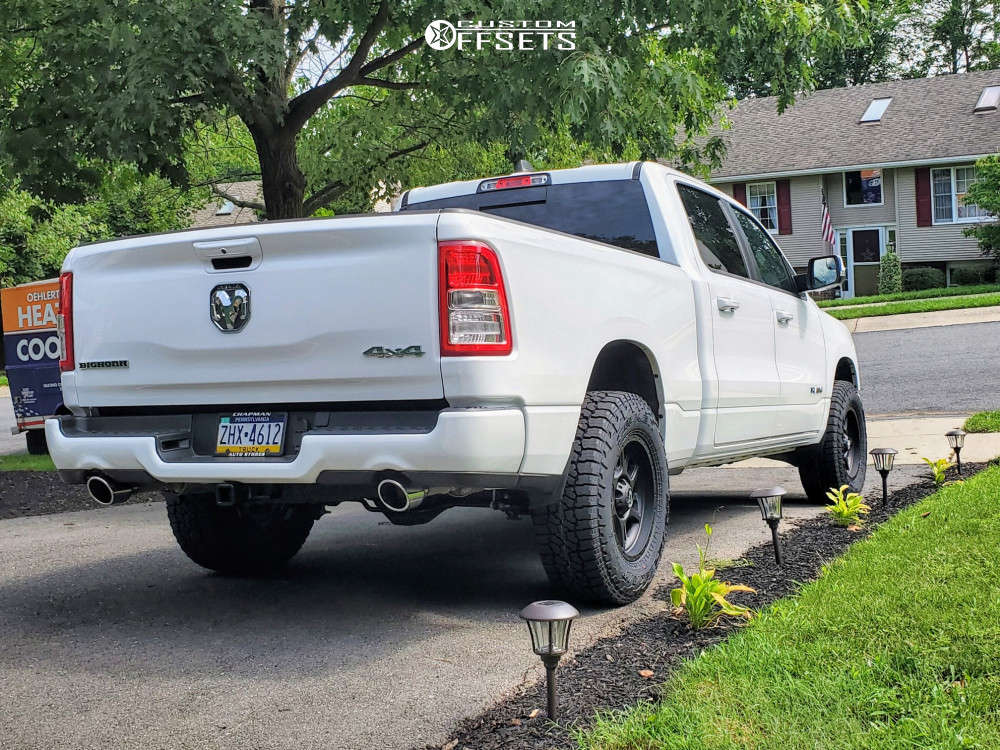 2019 Ram 1500 with 18x9 -12 Vision Split and 275/70R18 Falken Wildpeak ...