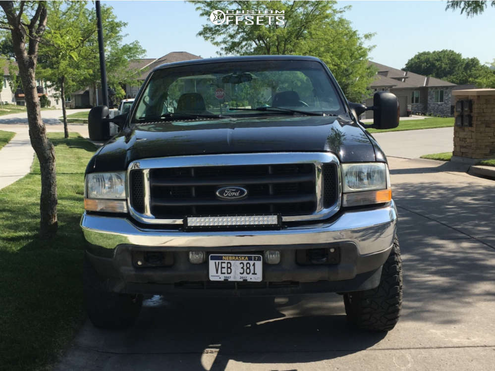 2003 Ford F-250 Super Duty with 16x10 -25 Pro Comp 69 and 33/12.5R16 ...