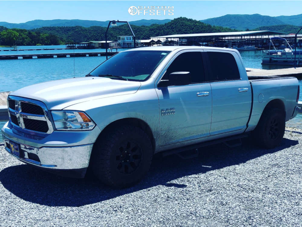 2016 Ram 1500 with 17x9 -12 Helo He878 and 33/12.5R17 Nitto Ridge ...