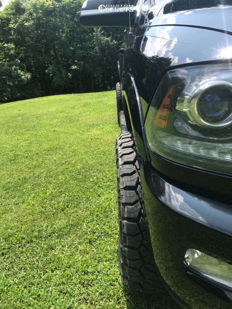 2014 Ram 2500 with 20x10 -19 Hostile H108 and 33/11.5R20 Nitto Ridge ...