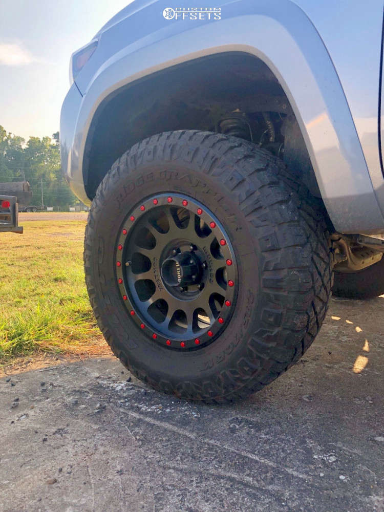 2017 Toyota Tacoma with 17x8.5 0 Method Nv and 285/70R17 Nitto Ridge ...