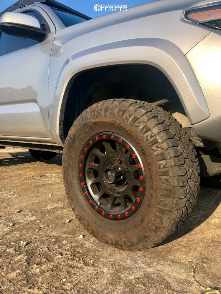 2017 Toyota Tacoma with 17x8.5 0 Method Nv and 285/70R17 Nitto Ridge ...