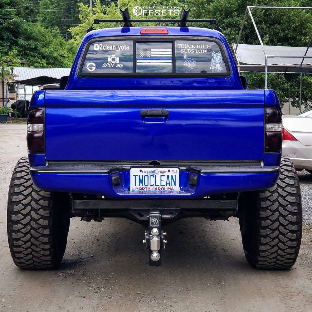 2002 Toyota Tacoma with 24x14 -76 TIS 544BM and 35/12.5R24 RBP Repulsor ...