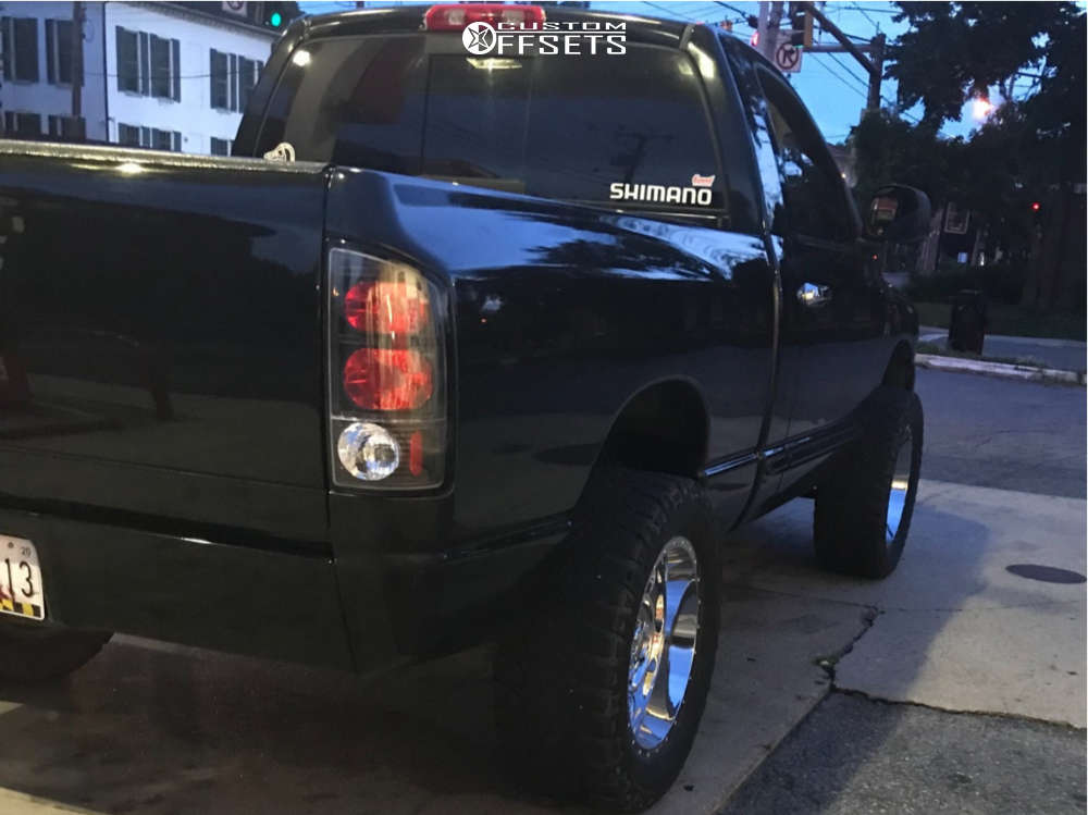 2004 Dodge Ram 1500 with 20x10 -24 Moto Metal Mo964 and 35/12.5R20 ...