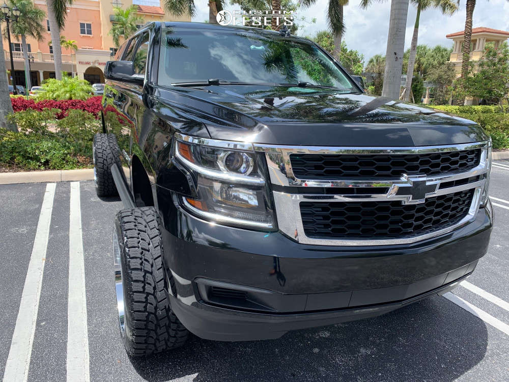 2016 Chevrolet Suburban with 22x12 -51 Vision Rocker and 33/12.5R22 ...