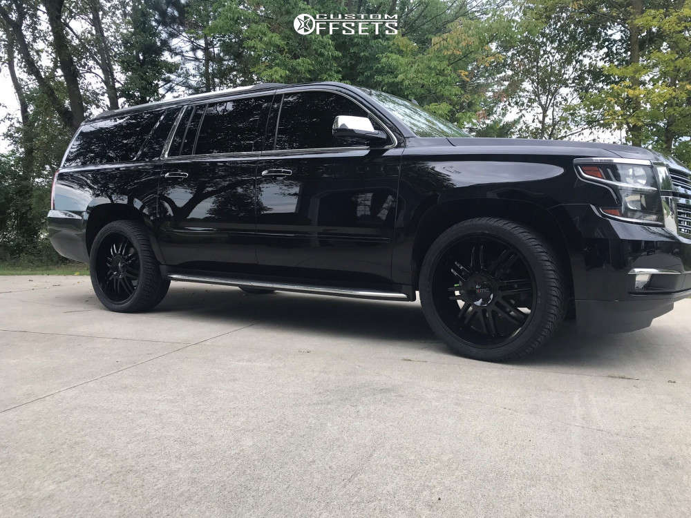 2016 Chevrolet Suburban with 24x10 30 KMC KM714 and 305/35R24 Atturo ...