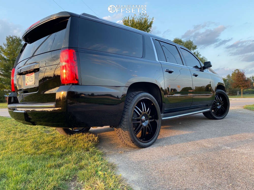 2016 Chevrolet Suburban with 24x10 30 KMC KM714 and 305/35R24 Atturo ...