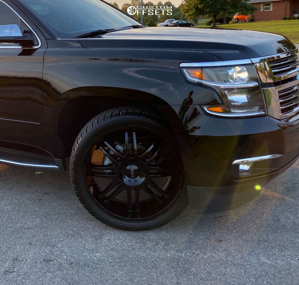 2016 Chevrolet Suburban with 24x10 30 KMC KM714 and 305/35R24 Atturo ...