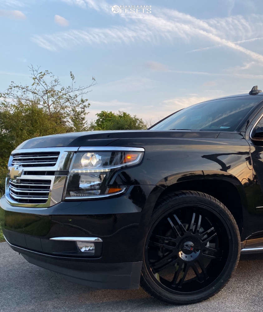 2016 Chevrolet Suburban with 24x10 30 KMC KM714 and 305/35R24 Atturo ...