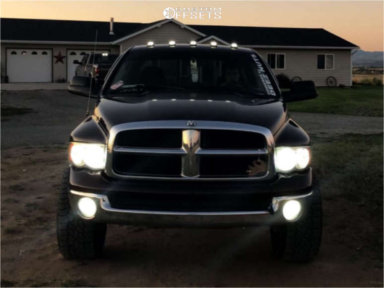 2005 Dodge Ram 1500 with 20x12 -44 Work Conquest and 305/55R20 Falken ...