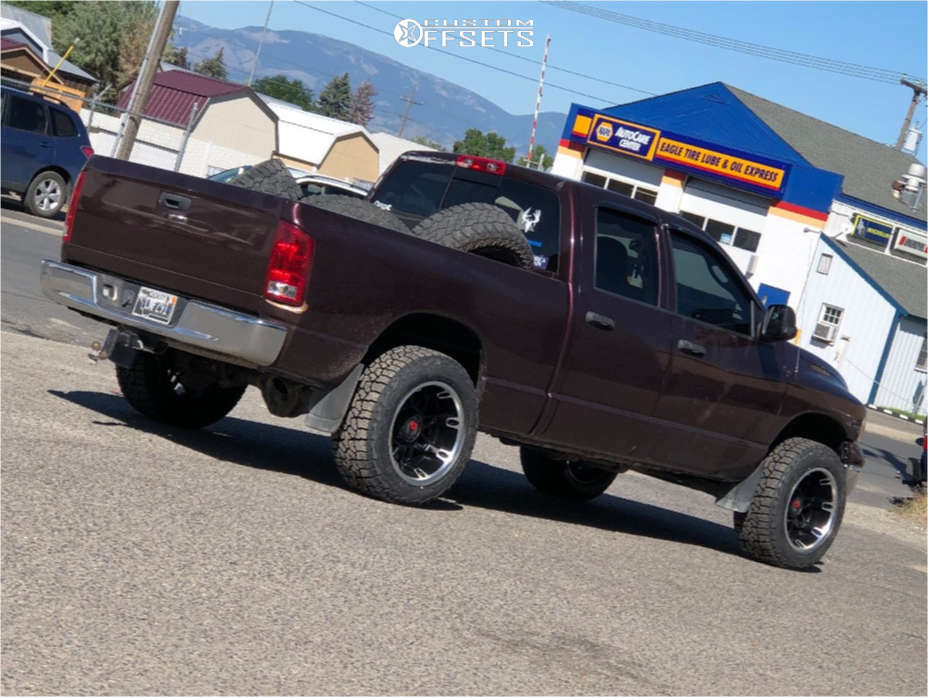 2005 Dodge Ram 1500 with 20x12 -44 Work Conquest and 305/55R20 Falken ...