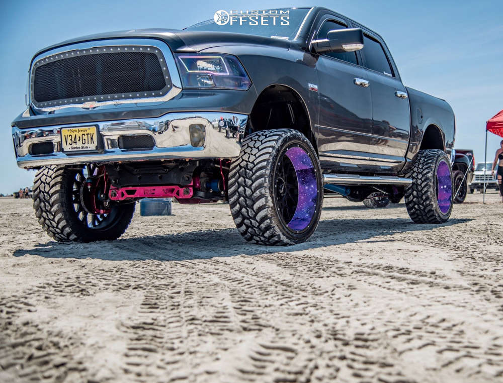 2014 Ram 1500 with 24x12 -51 Vision Rocker and 35/13.5R24 AMP Mud ...