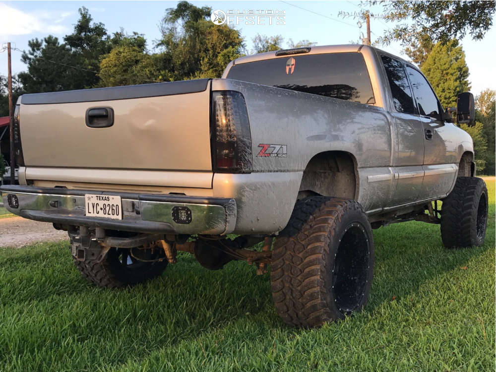 2002 GMC Sierra 1500 with 22x14 -76 American Truxx Striker and 37/13.5R22 AMP Mud Terrain Attack ...