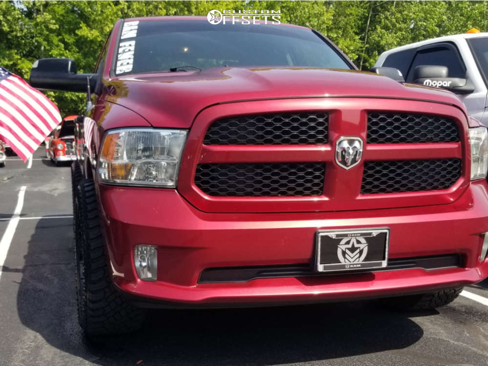 2014 Ram 1500 with 20x10 -24 Anthem Off-Road Enforcer and 305/55R20 ...
