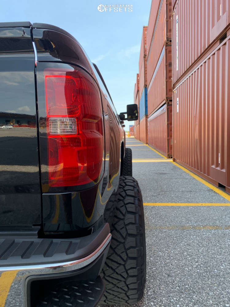 2015 Chevrolet Silverado 1500 with 22x12 -44 Hostile Sprocket and 35/12.5R22 Nitto Ridge ...