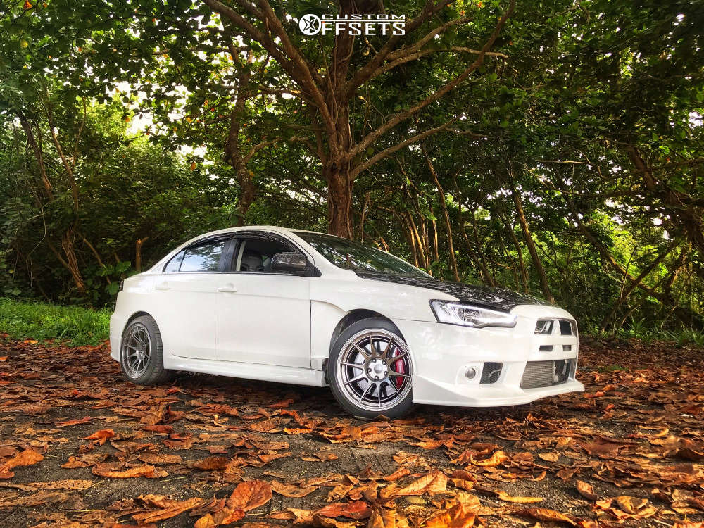 2014 Mitsubishi Lancer with 18x10.5 22 ESR Sr13 and 275/40R18 Nitto ...