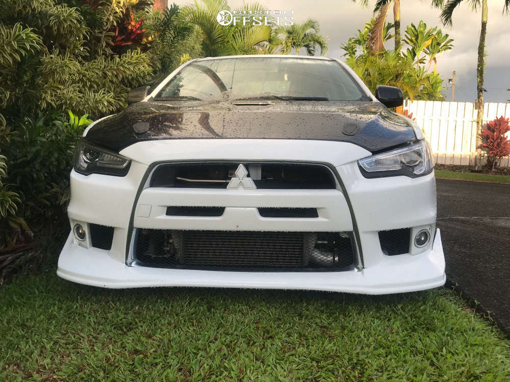 2014 Mitsubishi Lancer with 18x10.5 22 ESR Sr13 and 275/40R18 Nitto ...