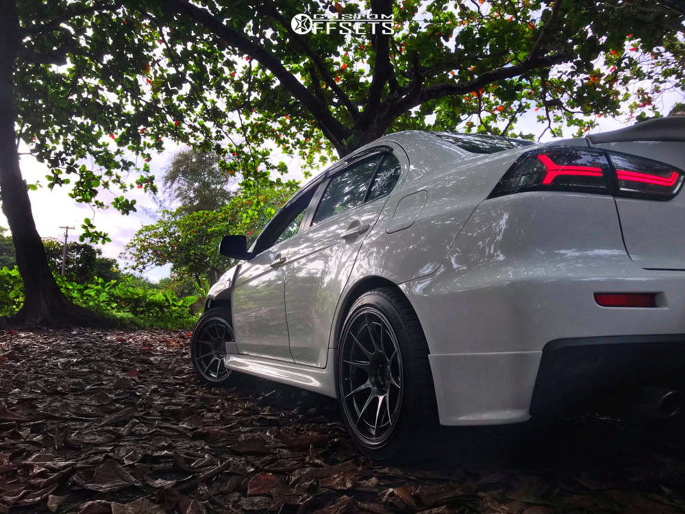 2014 Mitsubishi Lancer with 18x10.5 22 ESR Sr13 and 275/40R18 Nitto ...