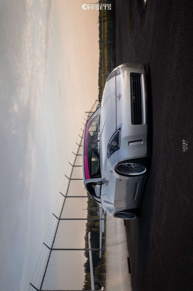 2005 Nissan 350Z with 18x10 -8 Work Vs Xx and 255/35R18 Firestone ...