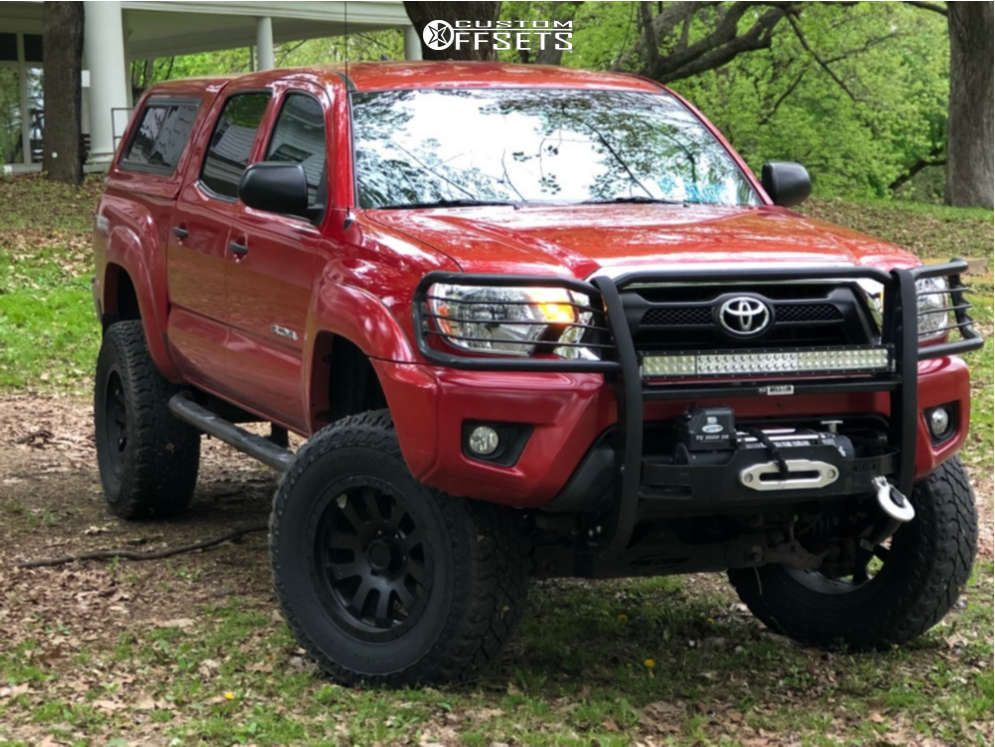 2012 Toyota Tacoma with 17x9 -6 Pro Comp Series 46 and 35/12.5R17 ...