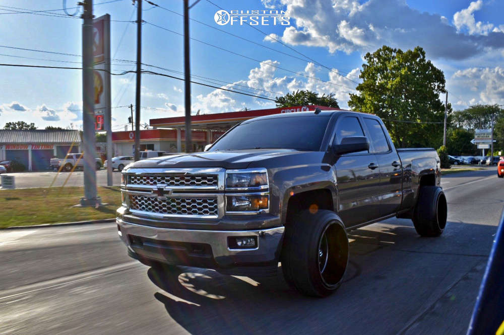 2014 Chevrolet Silverado 1500 with 22x14 -76 TIS 544bm and 305/40R22 ...