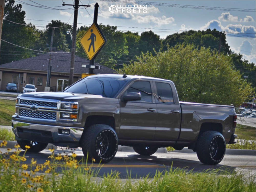 2014 Chevrolet Silverado 1500 with 22x14 -76 TIS 544bm and 305/40R22 ...