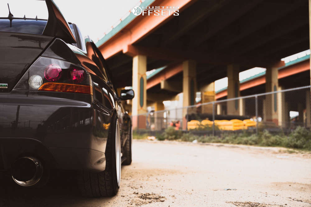 2006 Mitsubishi Lancer with 18x10.5 15 Enkei RPF1 and 245/40R18 Nitto ...