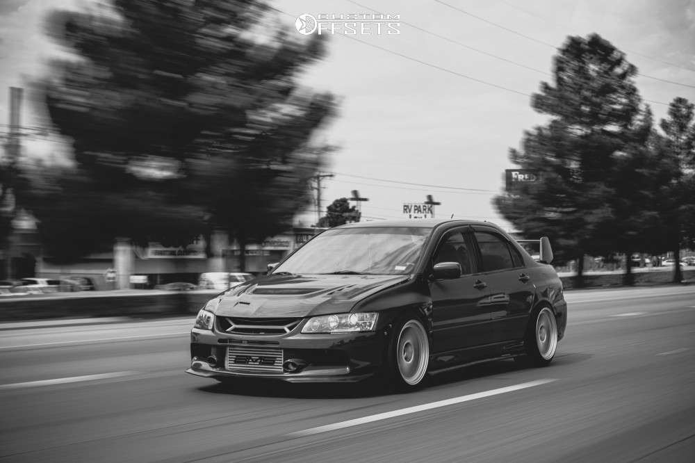 2006 Mitsubishi Lancer with 18x10.5 15 Enkei RPF1 and 245/40R18 Nitto ...