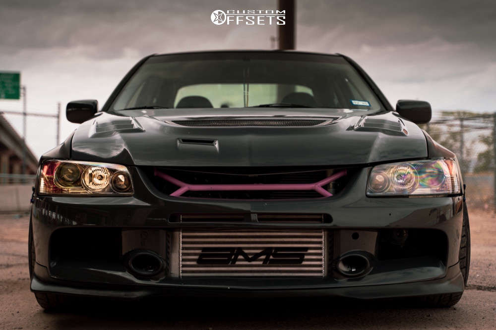 2006 Mitsubishi Lancer with 18x10.5 15 Enkei RPF1 and 245/40R18 Nitto ...