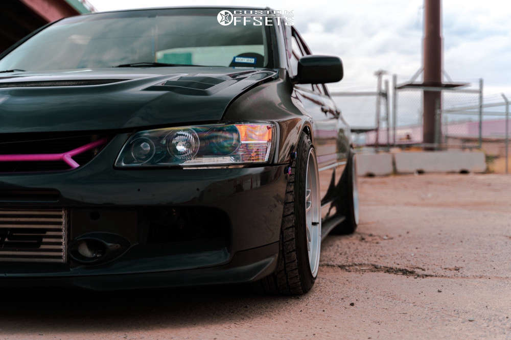 2006 Mitsubishi Lancer with 18x10.5 15 Enkei RPF1 and 245/40R18 Nitto ...