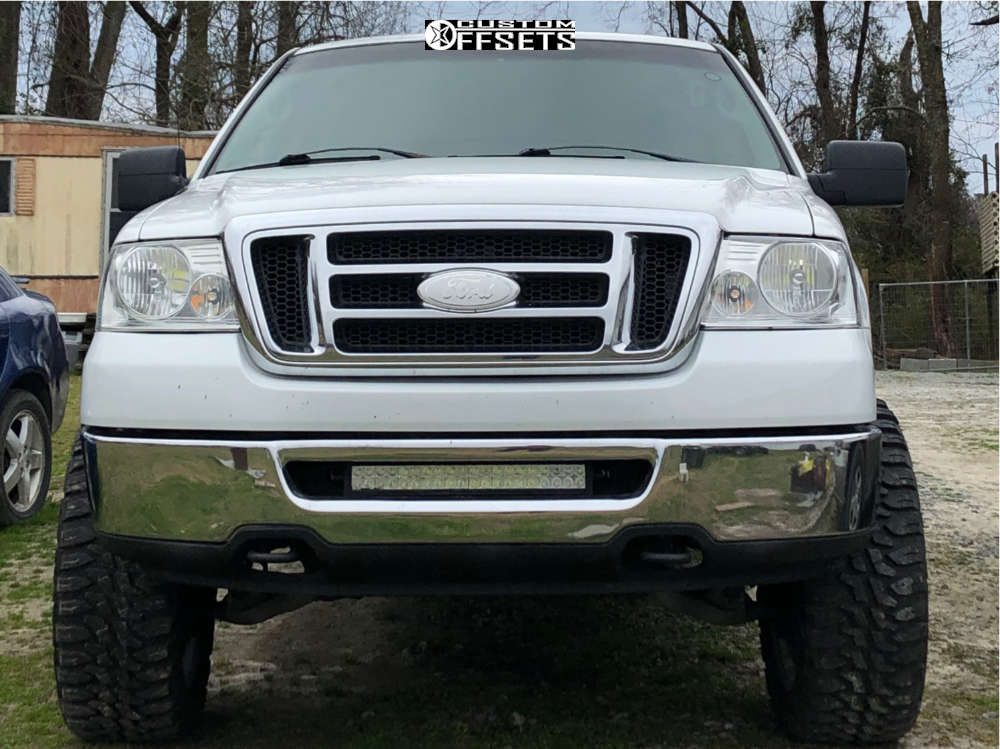 2007 Ford F-150 with 22x9.5 38 KMC Slide and 35/12.5R22 Haida Mud Champ ...