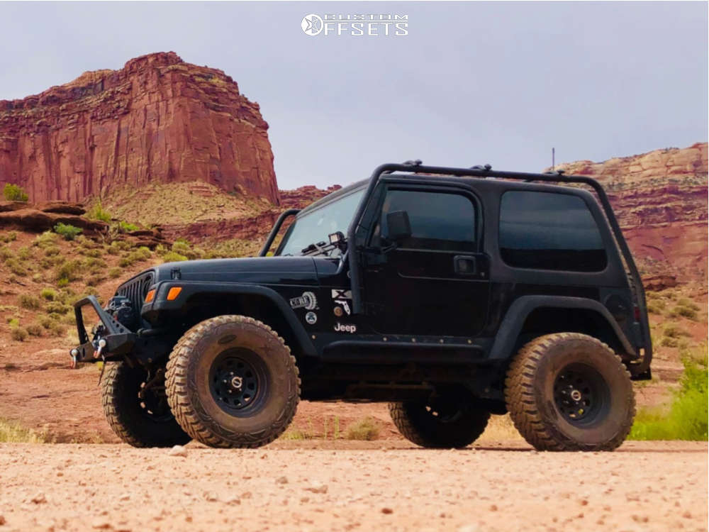 2002 Jeep TJ with 15x8 -12 Tactik D Window and 33/12.5R15 Pro Comp ...